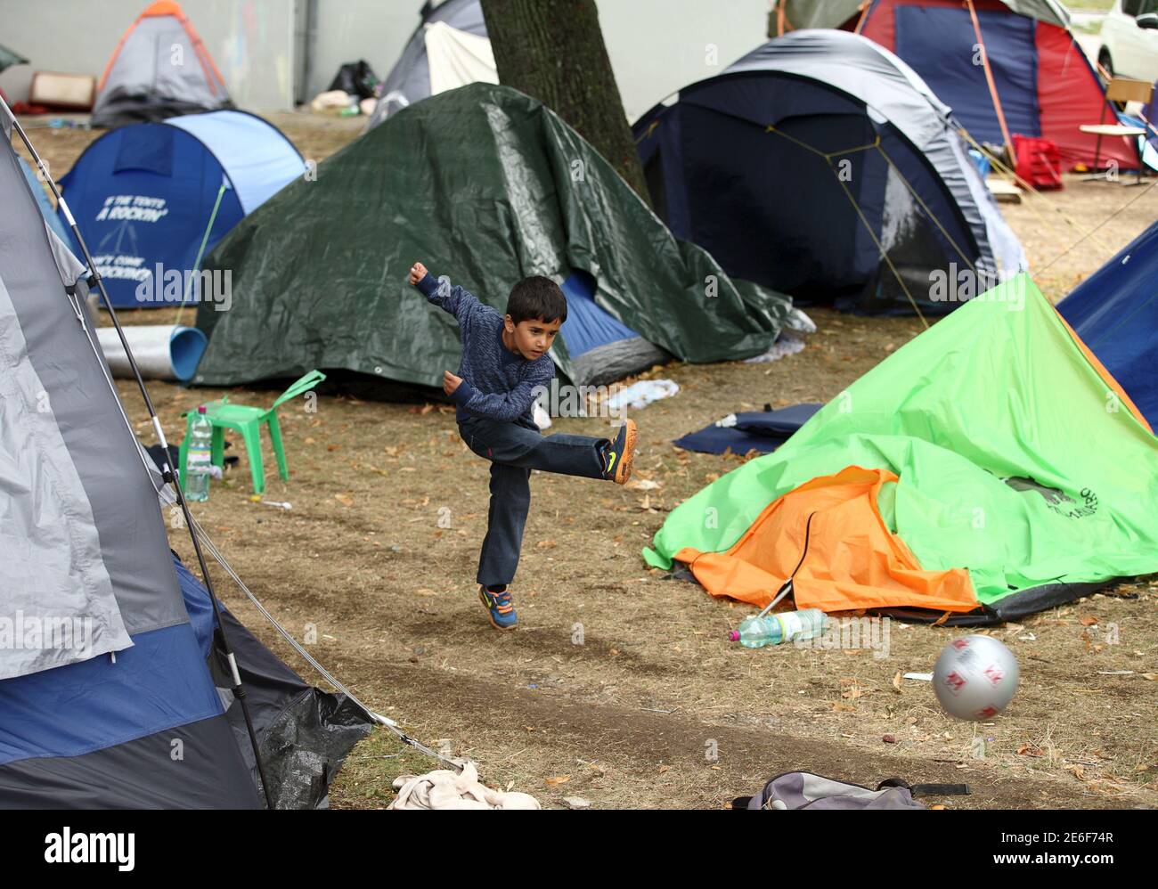Child refugees processing hi-res stock photography and images - Alamy