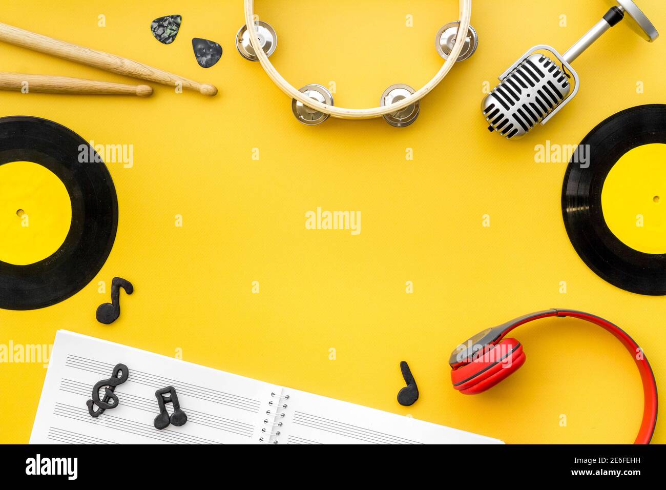 Frame of of music background - instrument with sheet music, top view ...