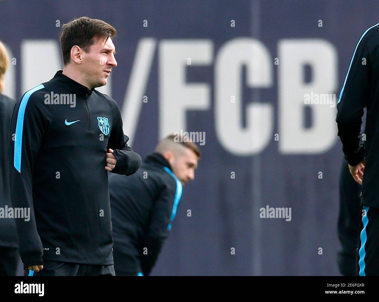 Barcelonas lionel messi attends training hi-res stock photography and ...
