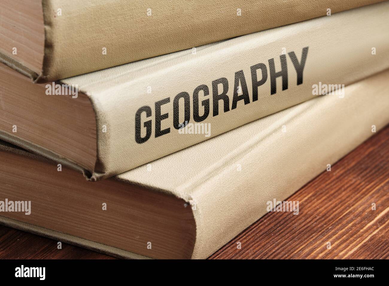 Geography subject book concept on a wooden table for learning Stock ...