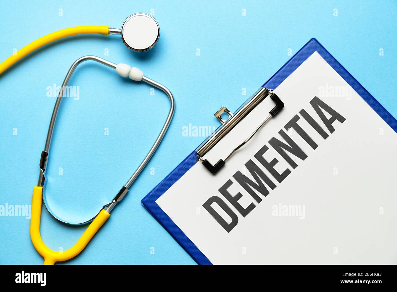 dementia diagnosis concept on medical tablet with documents with ...