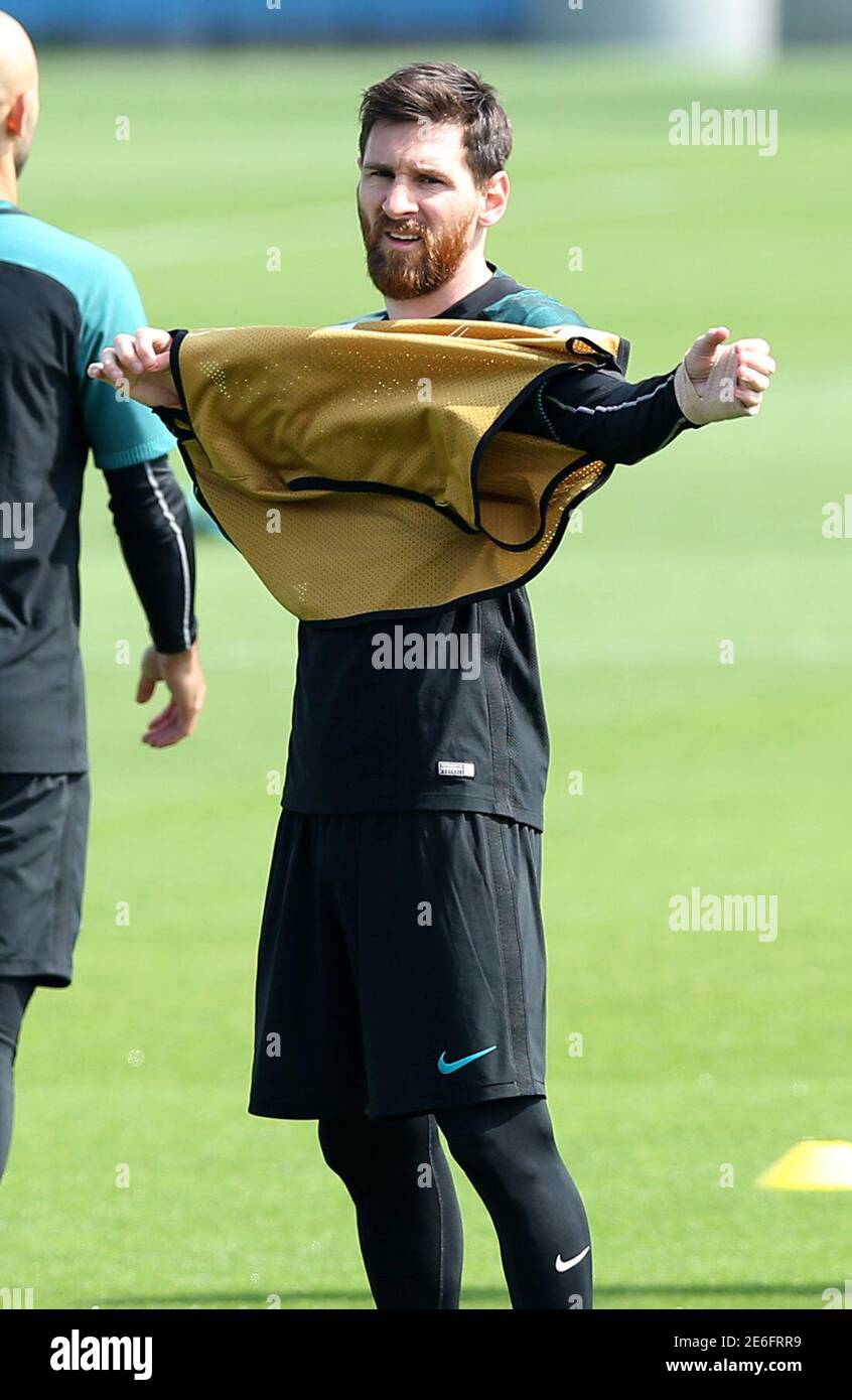 Barcelonas lionel messi attends training hi-res stock photography and ...