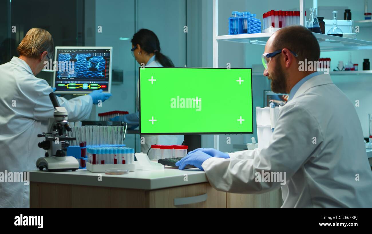 Researcher looking chroma key display hi-res stock photography and ...