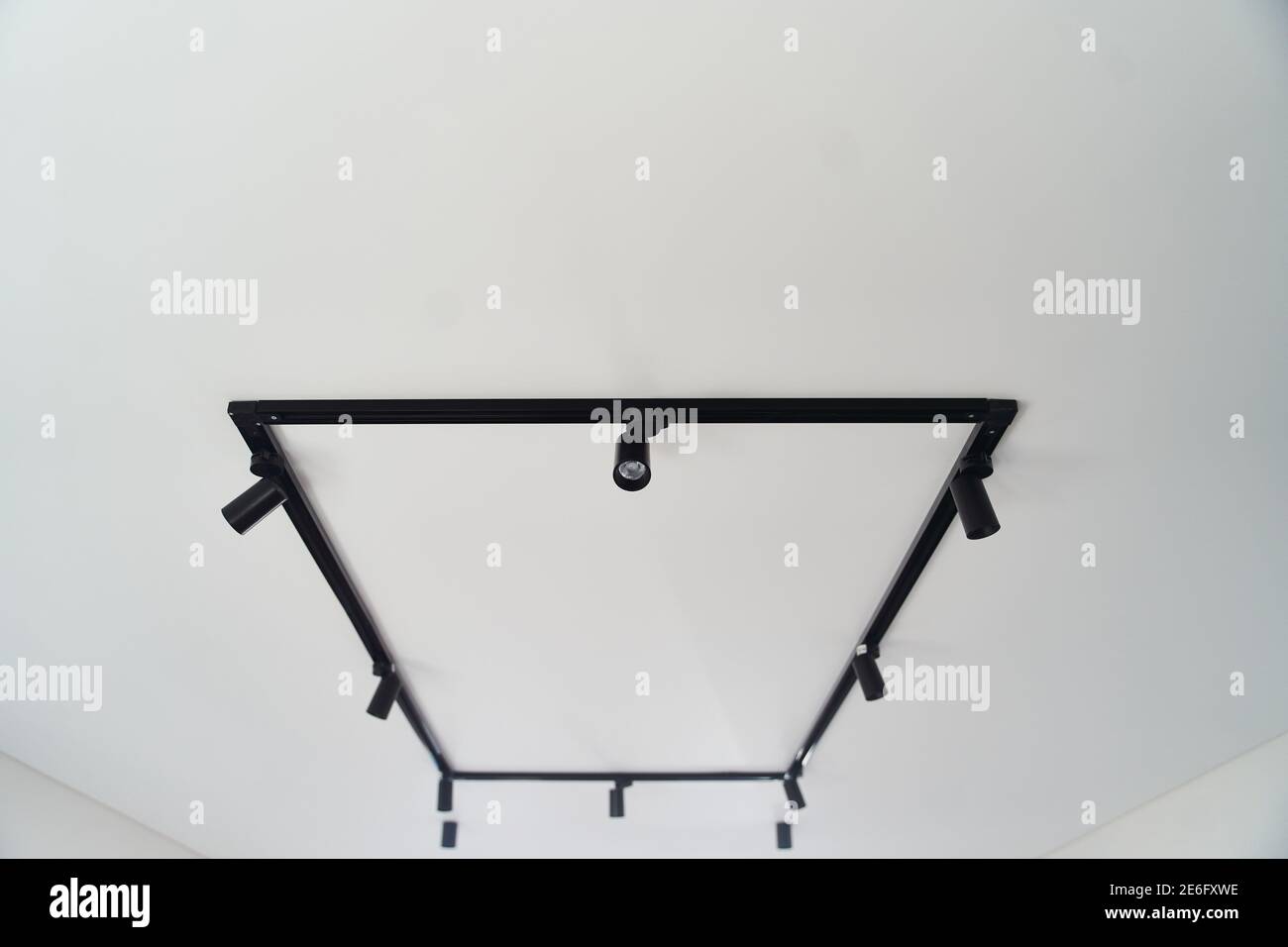 Modern LED black track lights in the interior Stock Photo - Alamy