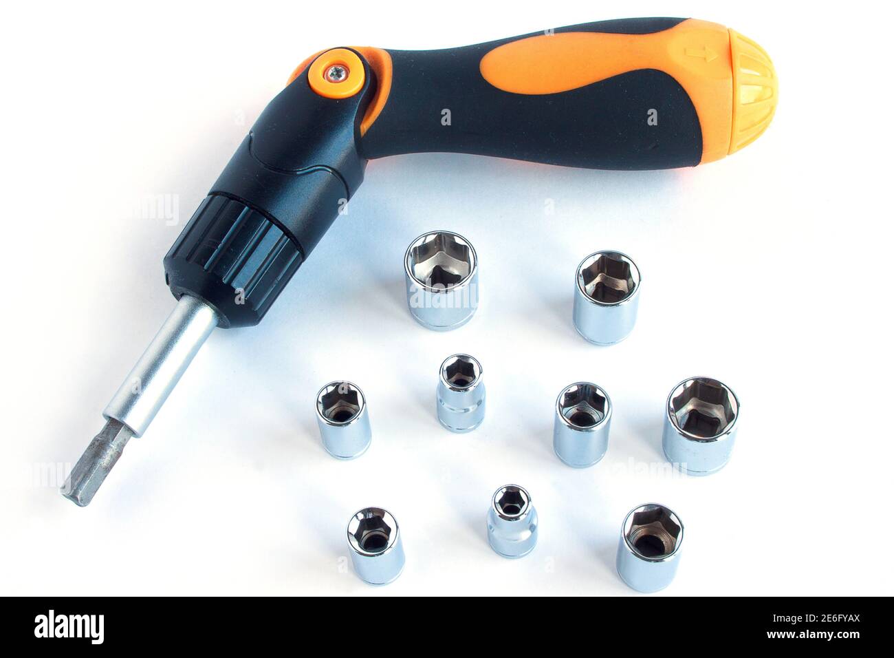 Screwdriver and set of accessories for various works. Isolated on a ...