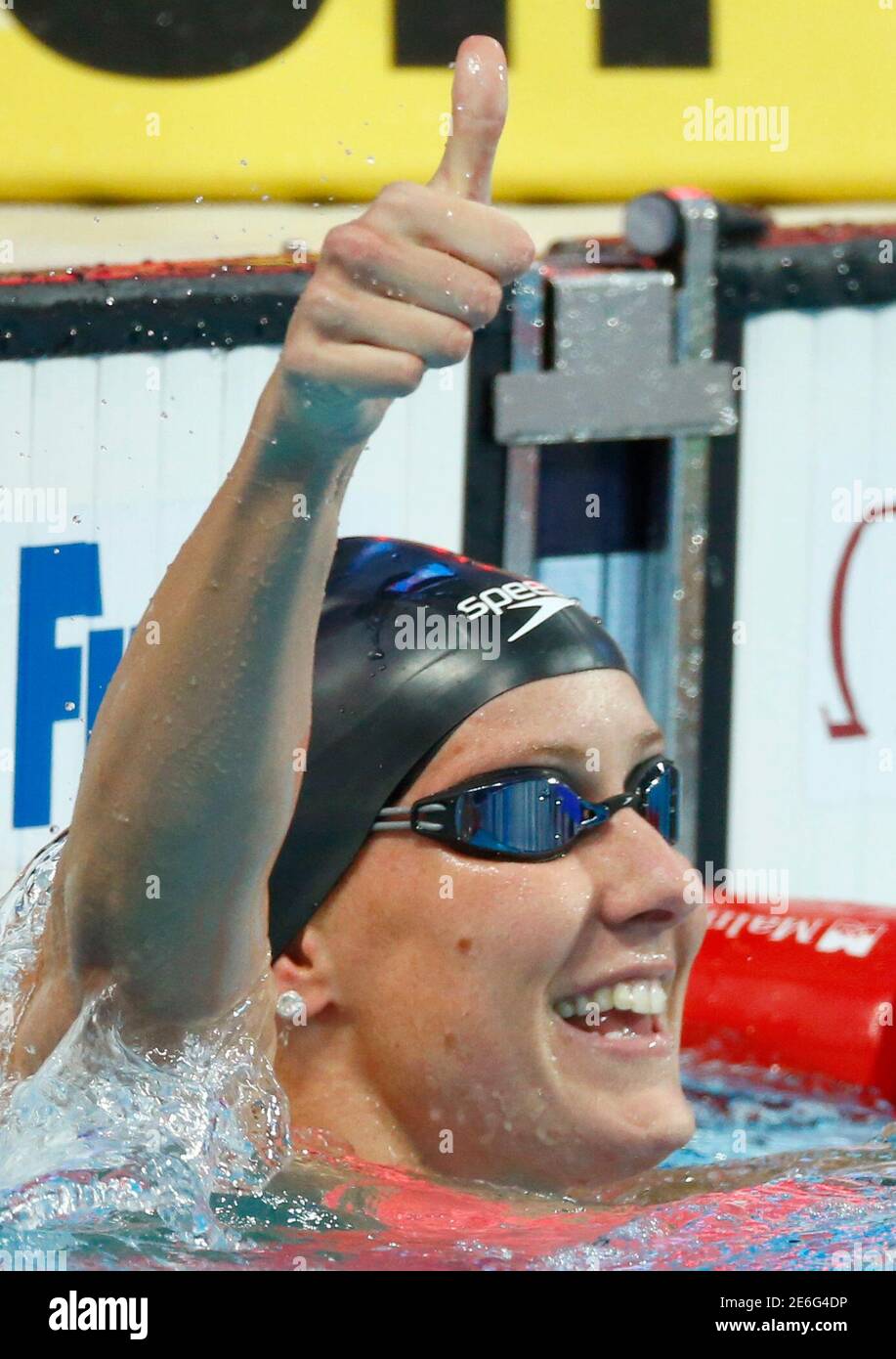Jessica Hardy of the U.S. reacts after a women's 50m breaststroke semi ...