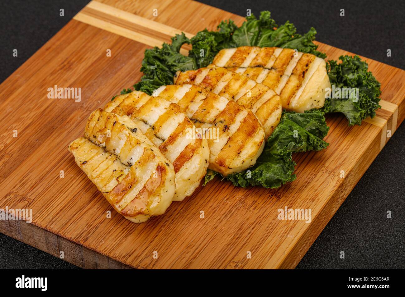 Grilled Greek haloumi cheese with herbs and spices Stock Photo - Alamy