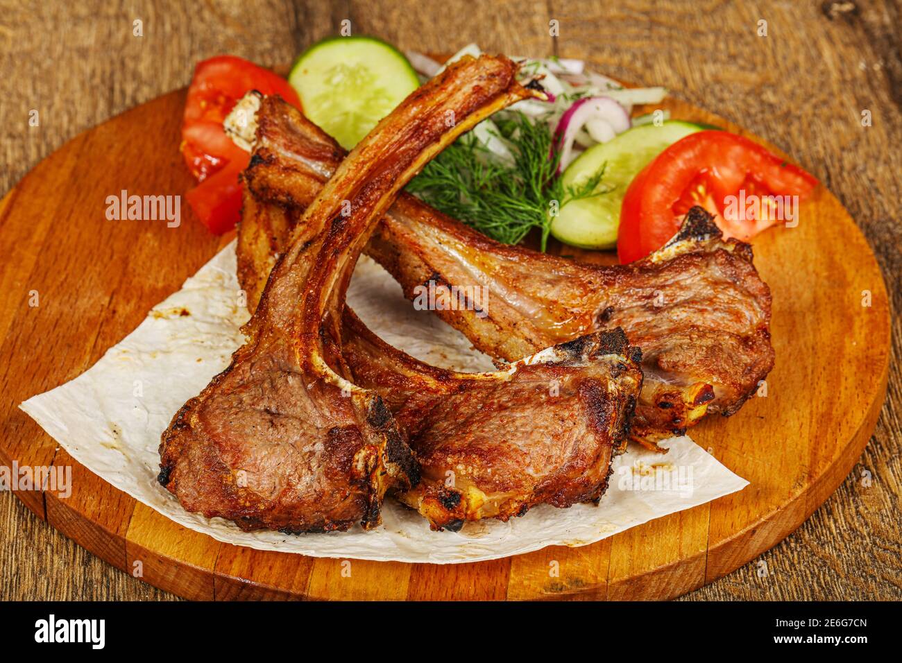 Grilled lamb barbeque served vegetables and onion Stock Photo - Alamy