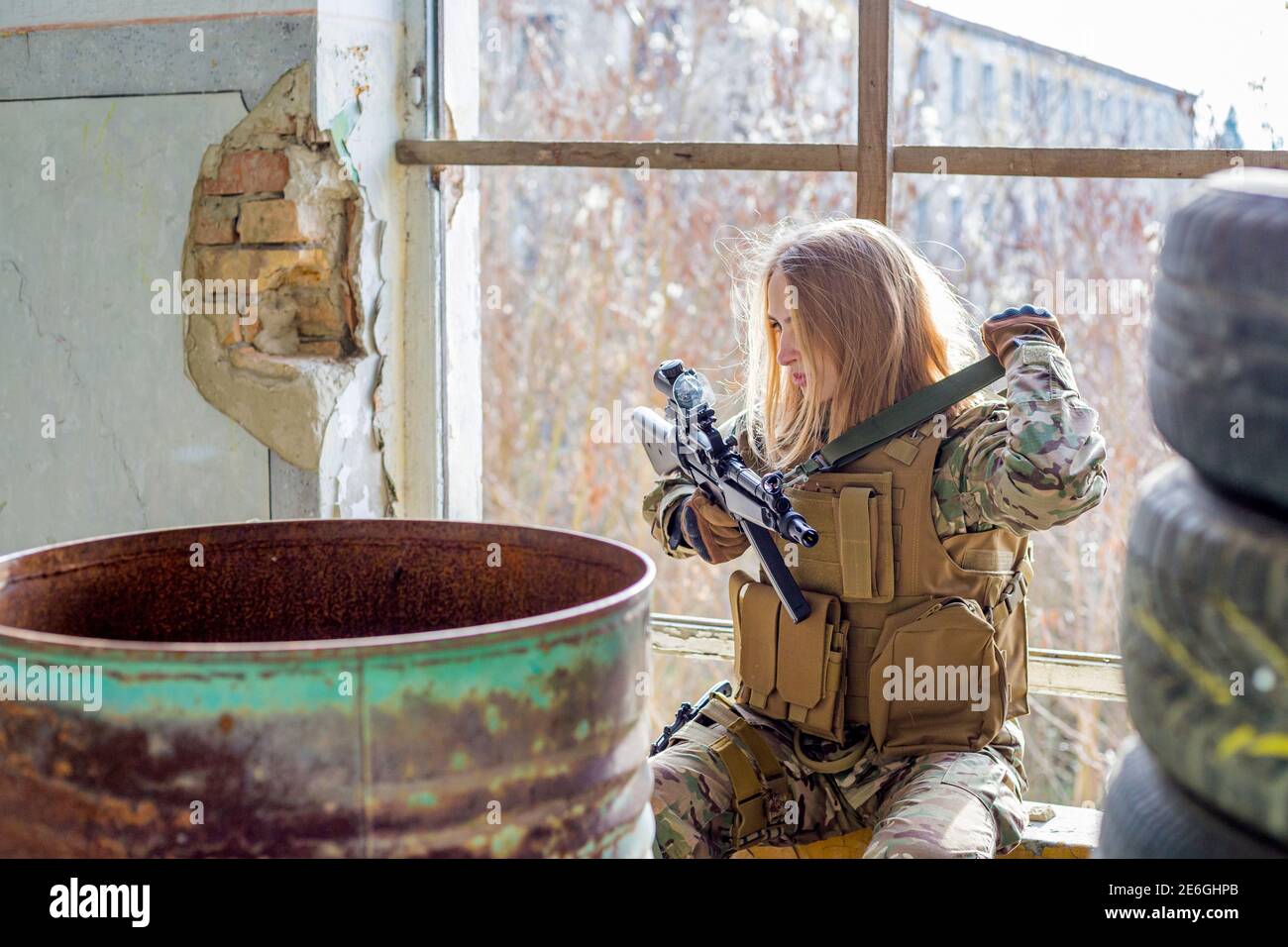 Military sitting gun hi-res stock photography and images - Alamy