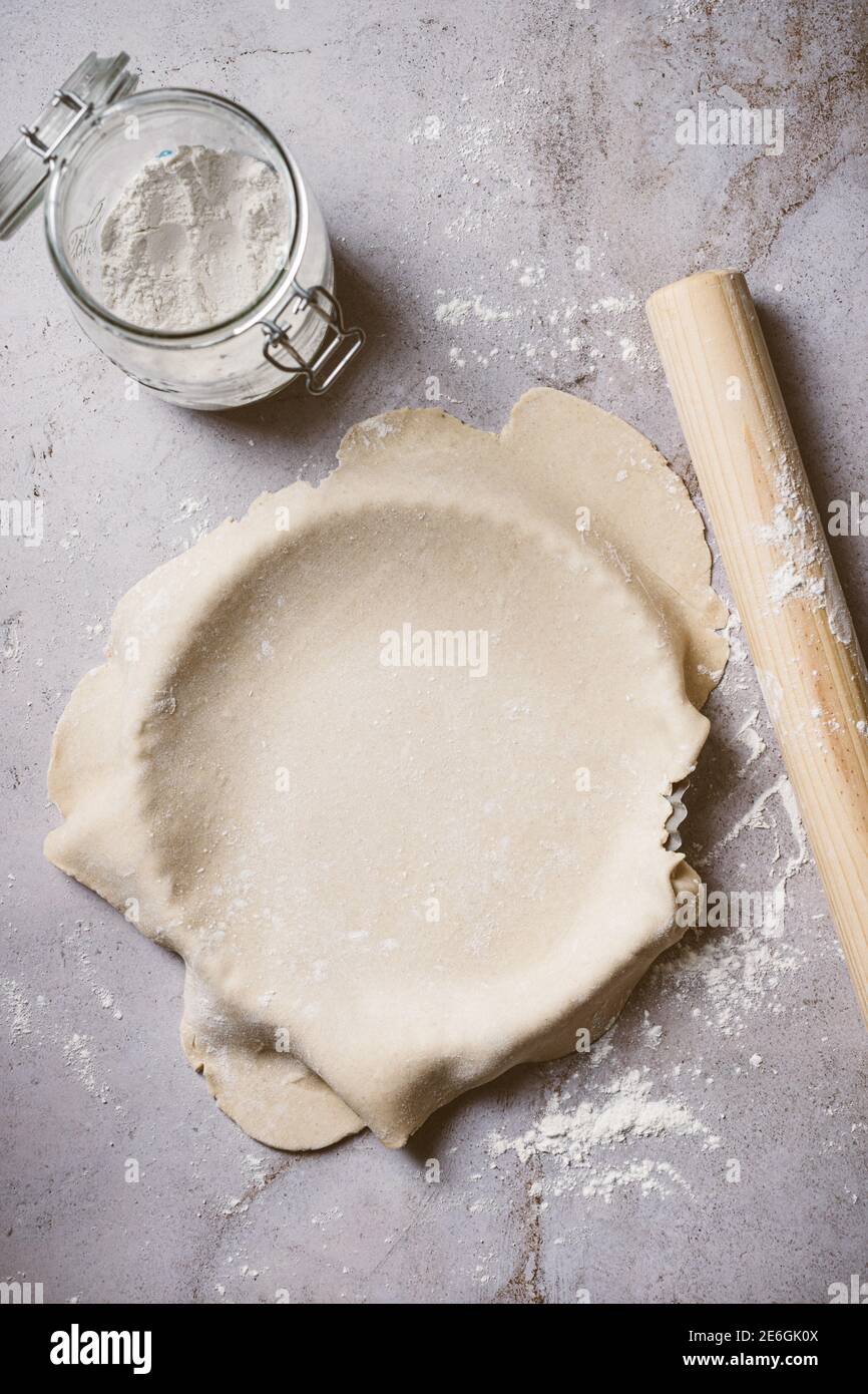 Pie pastry making in process on natural stone background Stock Photo ...