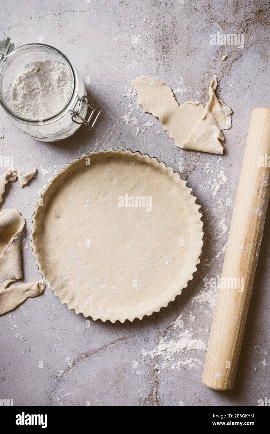 Pie pastry making in process on natural stone background Stock Photo ...