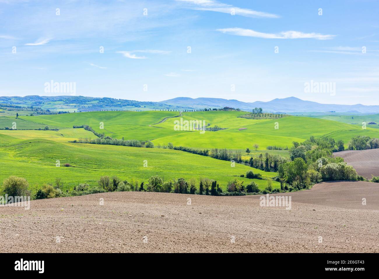 Italian rural landscape with new sown field Stock Photo - Alamy