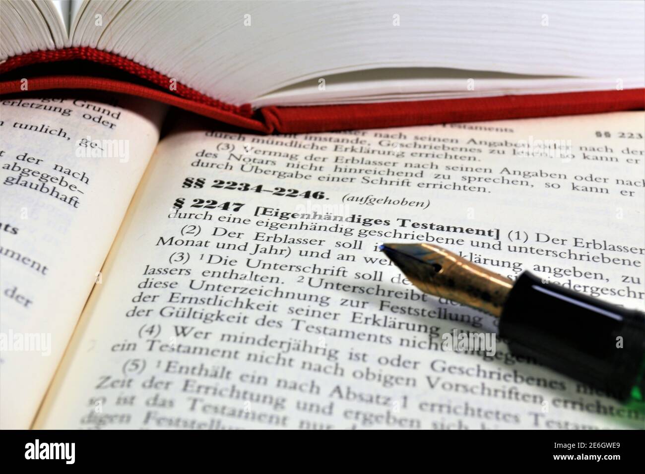 dictionary with a pen Stock Photo - Alamy