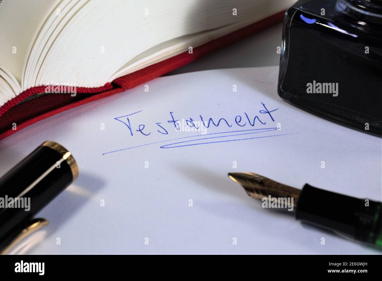 dictionary with a pen Stock Photo - Alamy