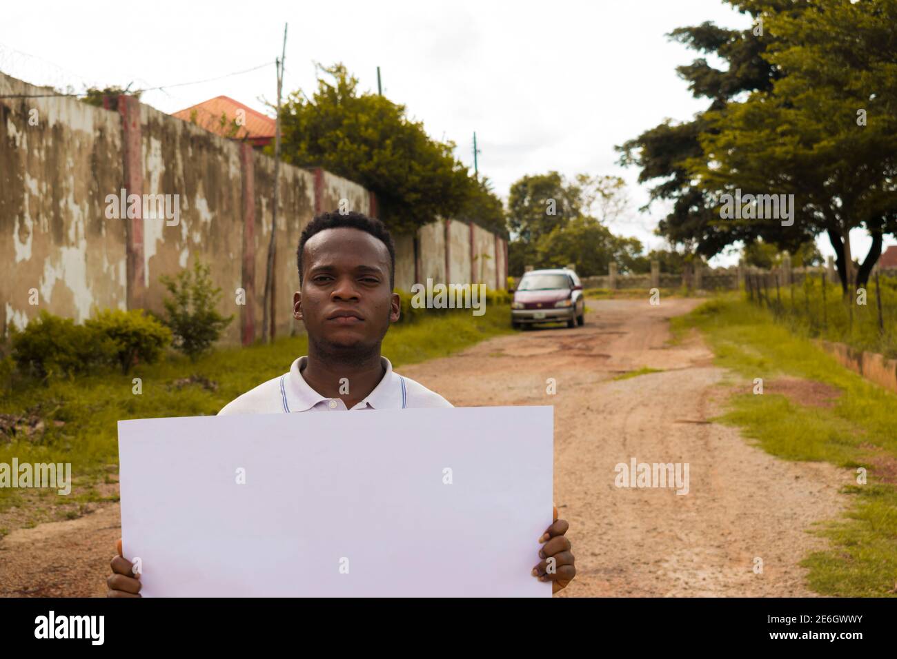 Demonstrator carrying placard protesting hi-res stock photography and ...