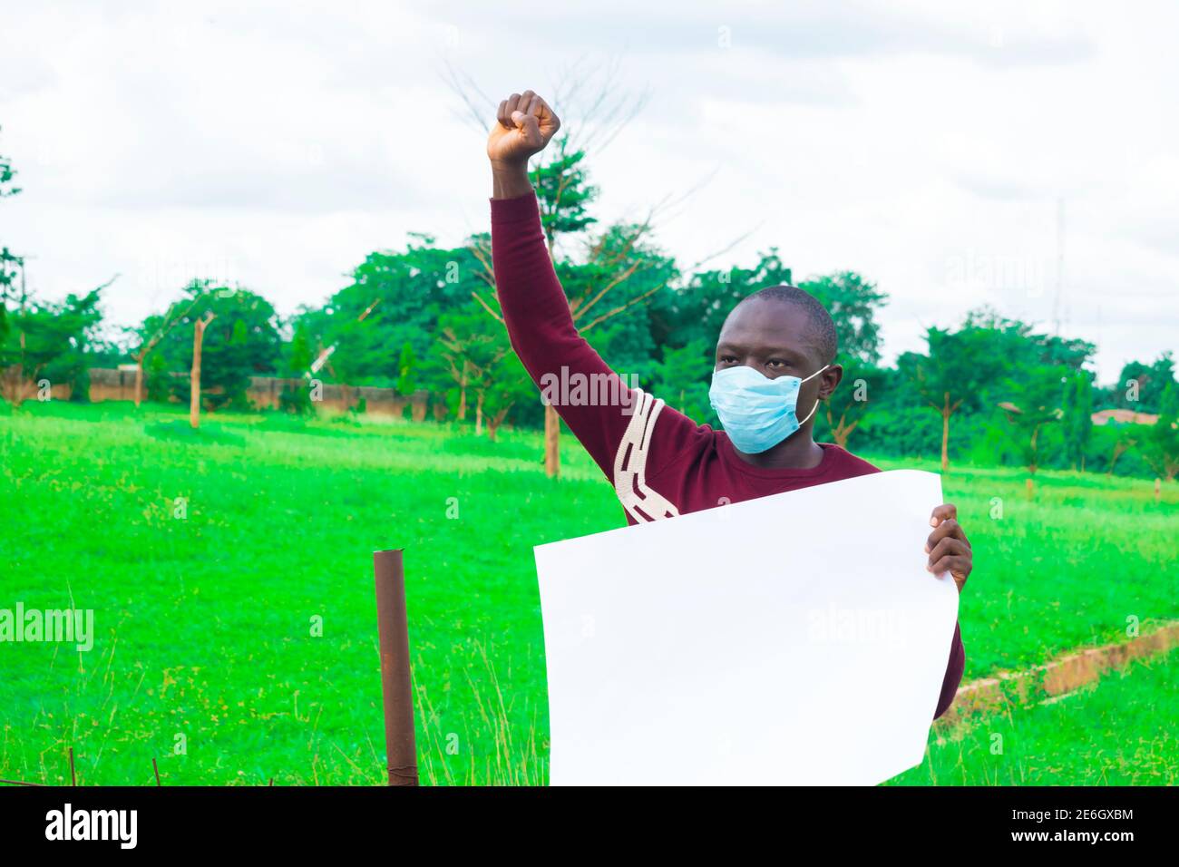Demonstrator carrying placard protesting hi-res stock photography and ...