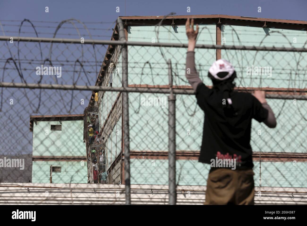 Man and prison and rear view hi-res stock photography and images - Alamy