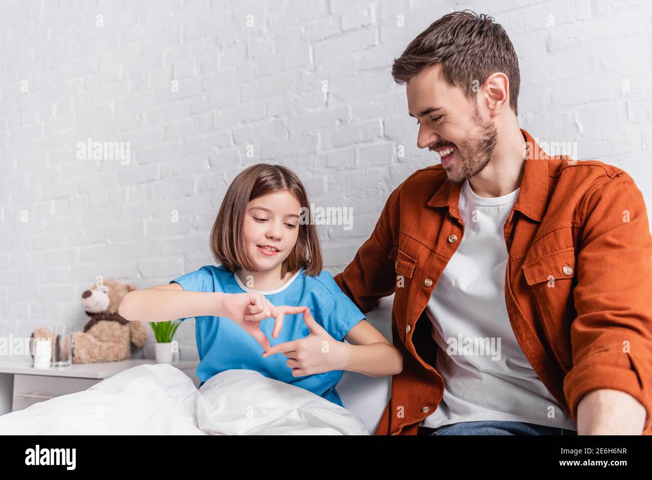 Daughter visiting dad in hospital hi-res stock photography and images ...