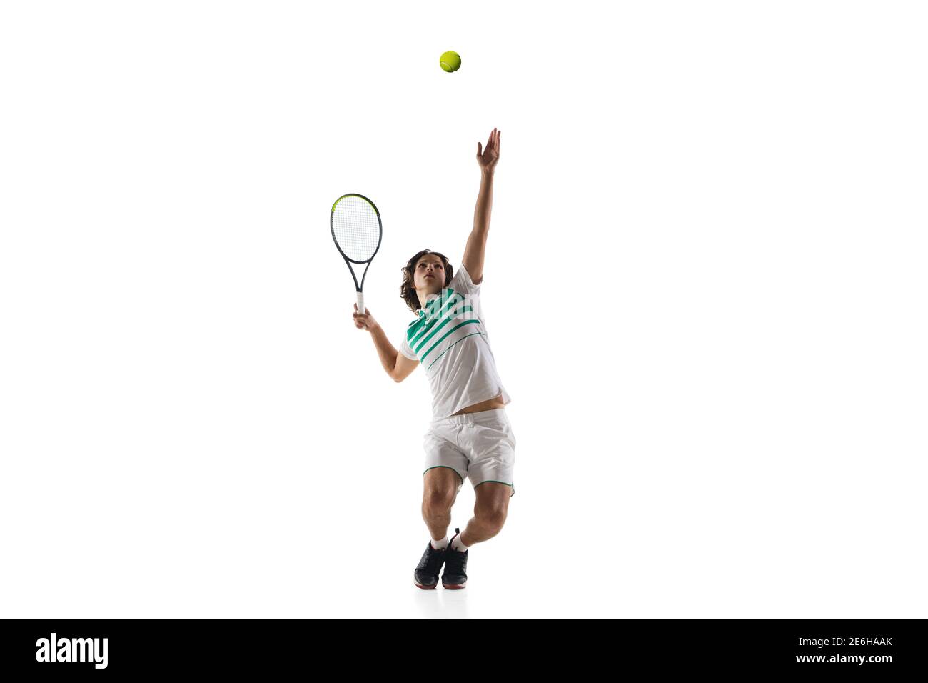 Jump. Young caucasian professional sportsman playing tennis isolated on ...