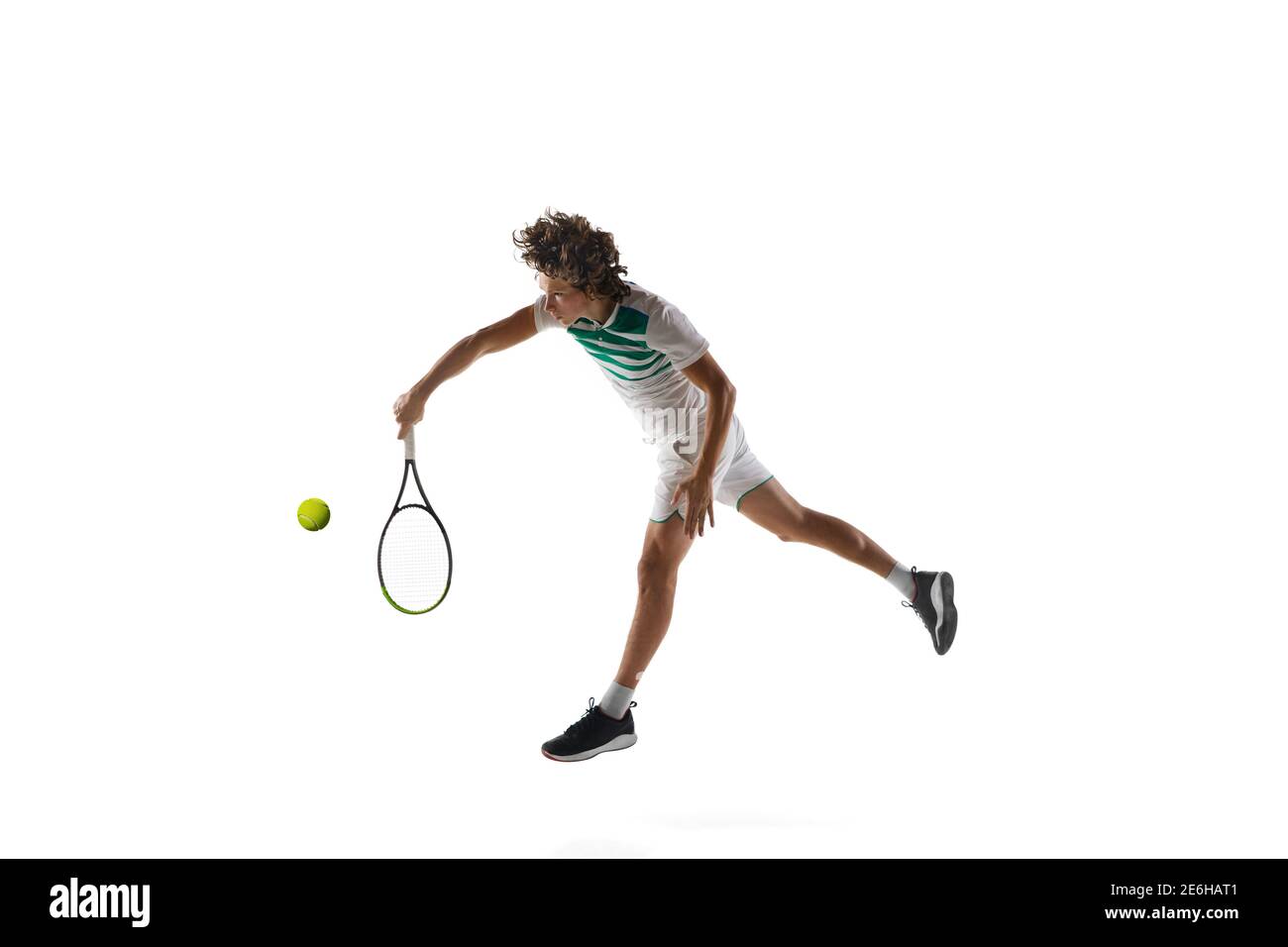 Speed. Young caucasian professional sportsman playing tennis isolated ...