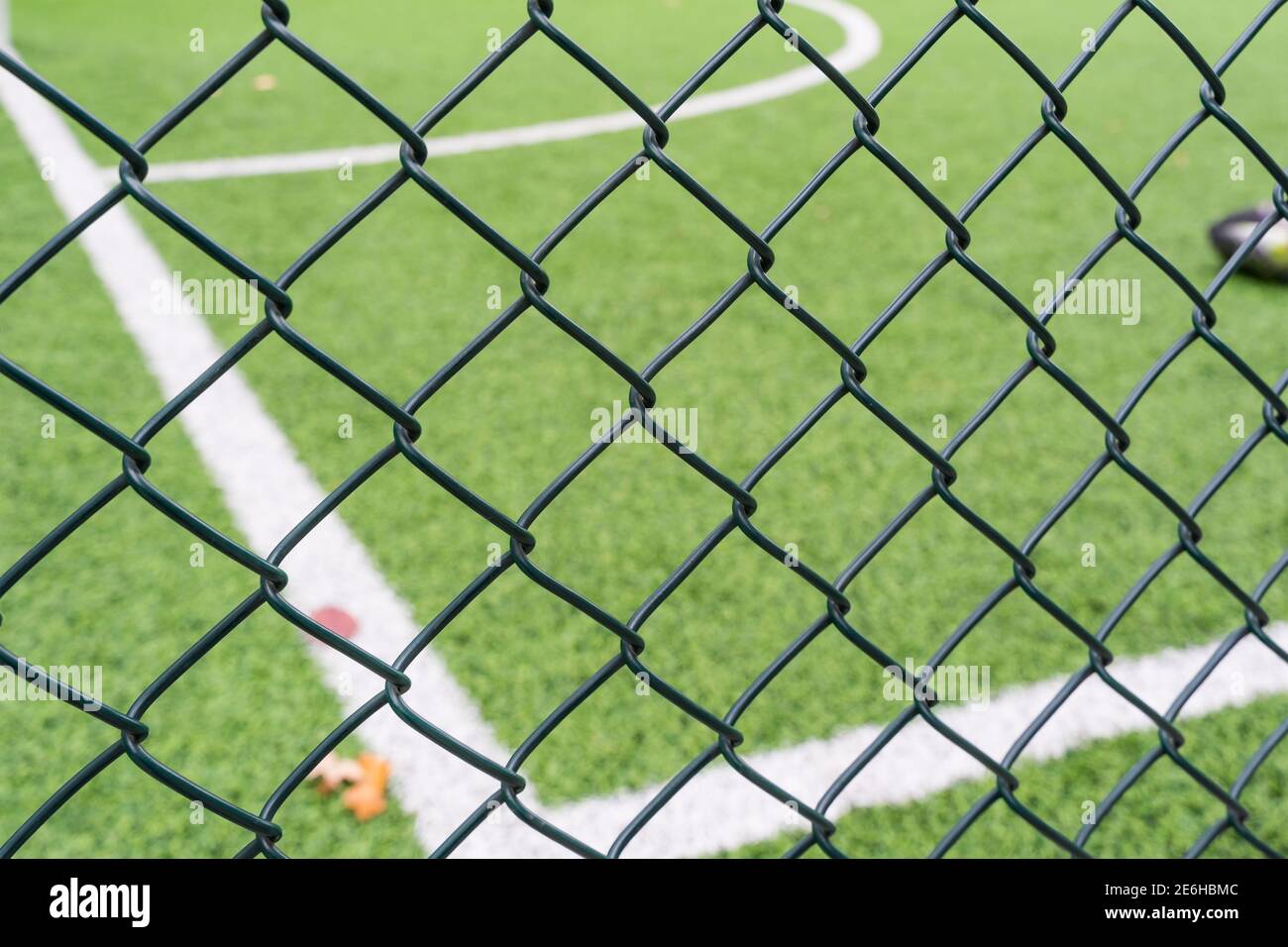 Fence netting close-up on a background of a soccer field Stock Photo ...