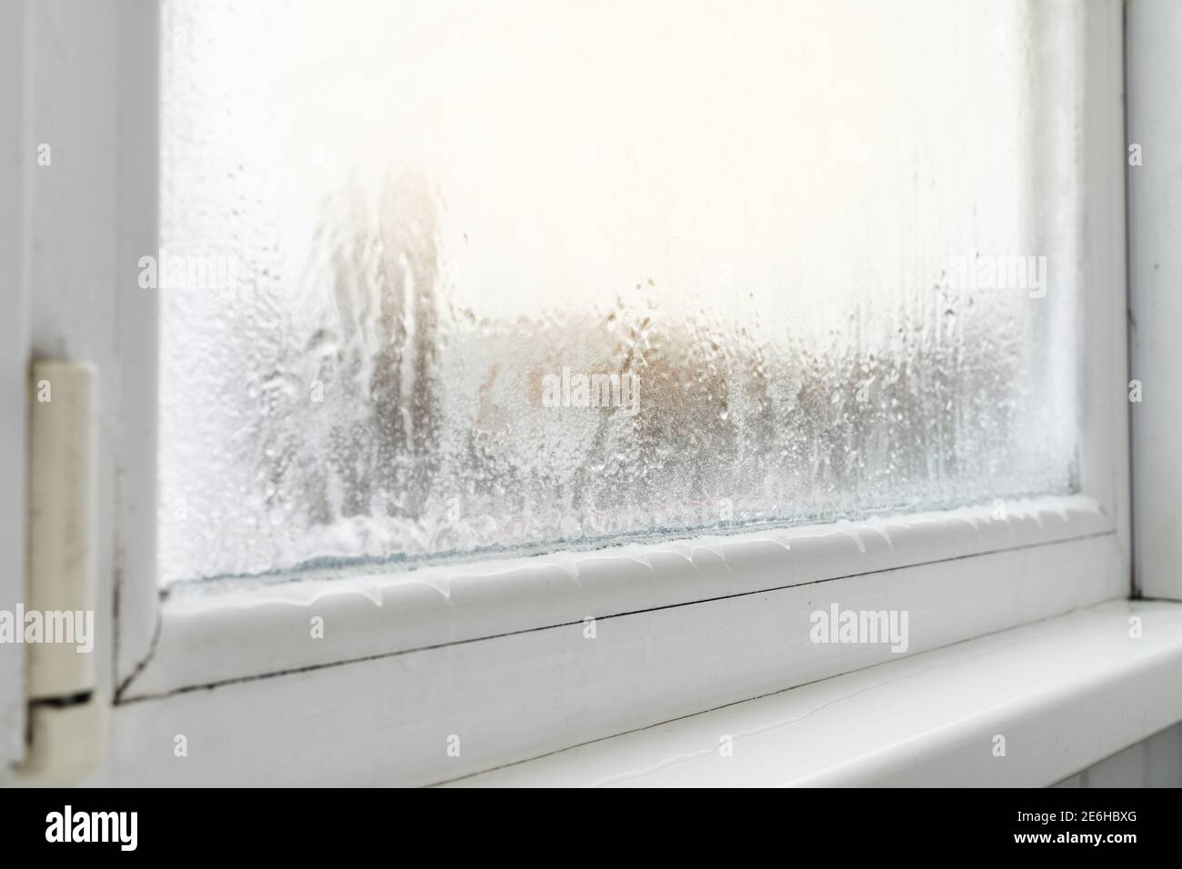 Close up of a defective plastic window with condensation and freezing ...