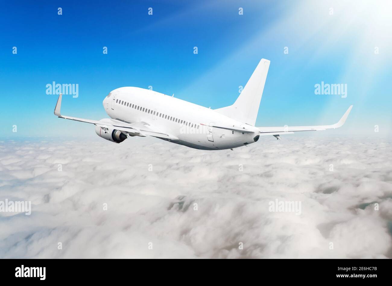 White airplane is climb flight heights, at the bottom there is a ...