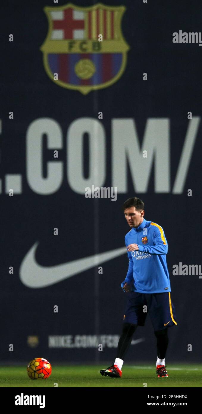 Barcelonas lionel messi attends training hi-res stock photography and ...