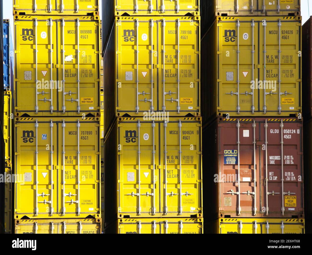 Freight containers stacked up ready to load at Felixstowe Docks Stock ...