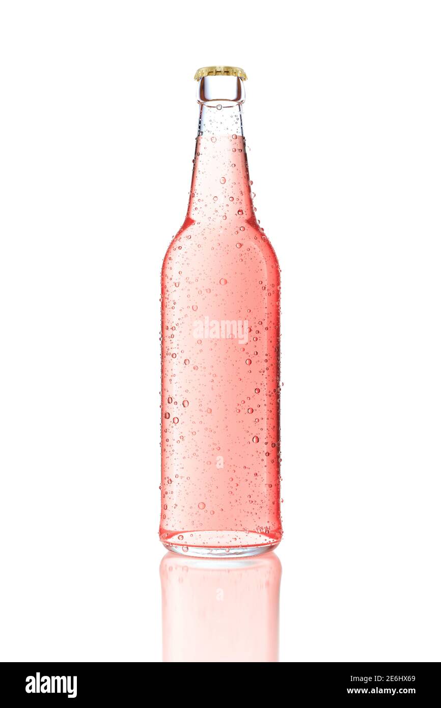 One transparent glass bottle. Pink drink in bottle with condensed water ...
