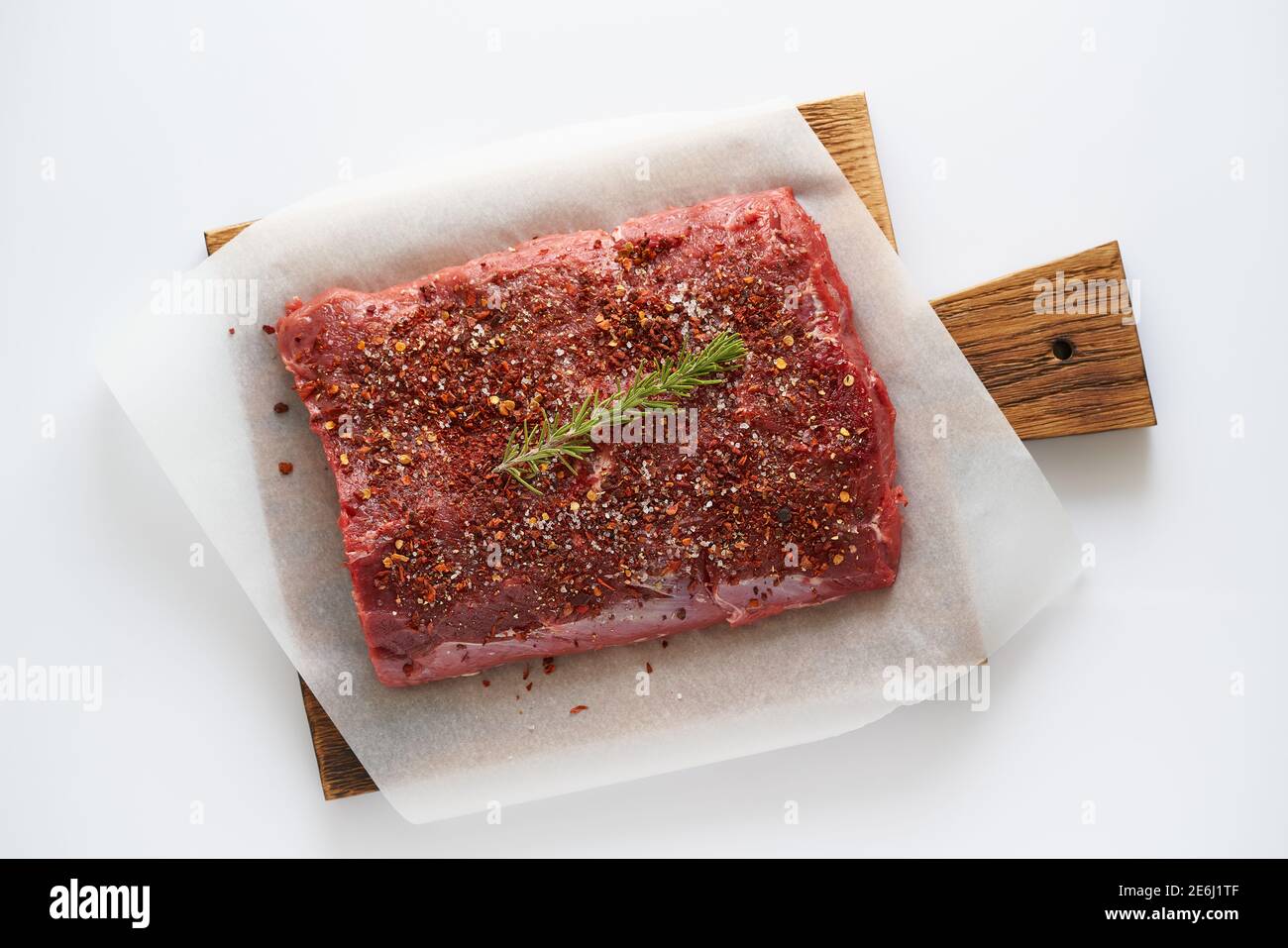 large piece of meat, raw beef fillet on white background. Striploin ...