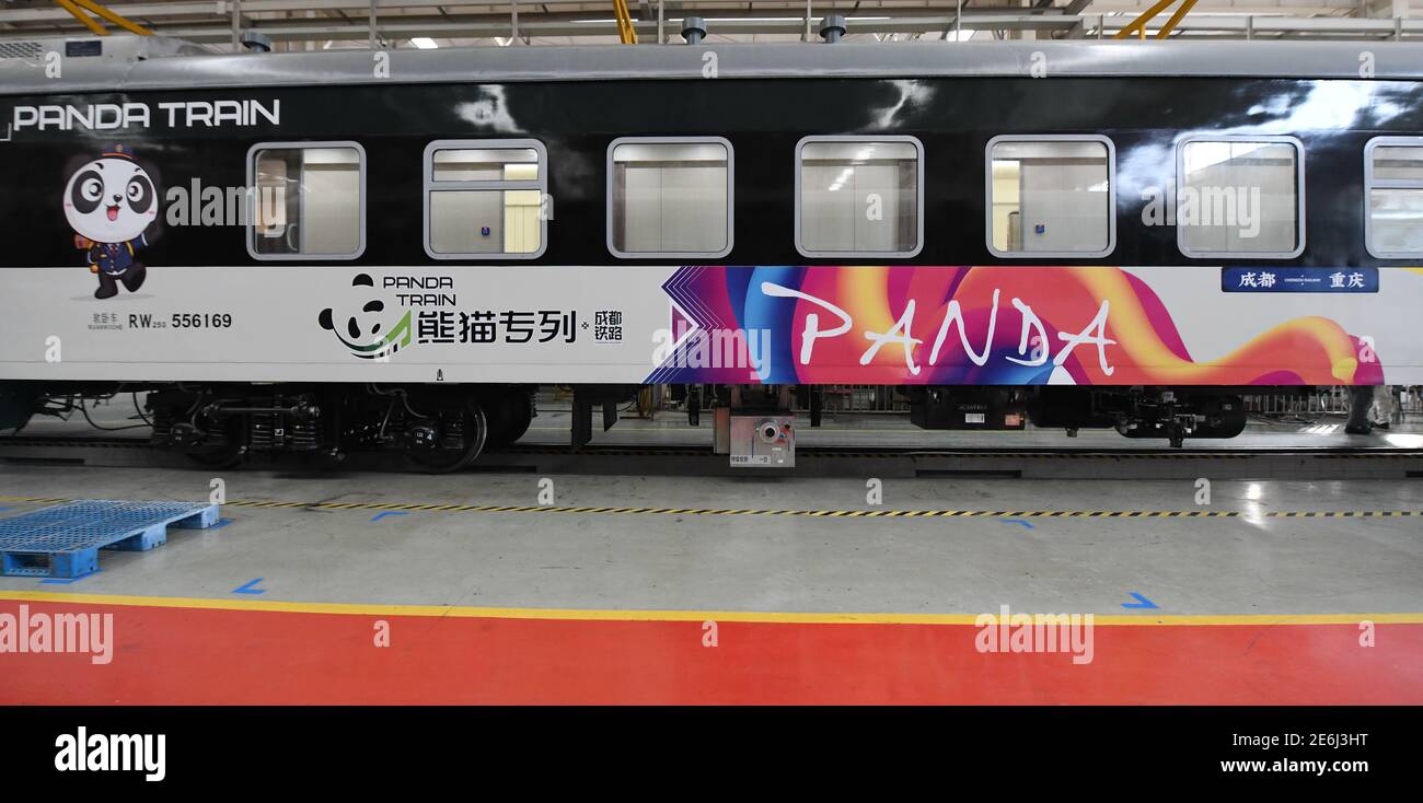 A giant panda limited express train makes its debut on the first day of ...