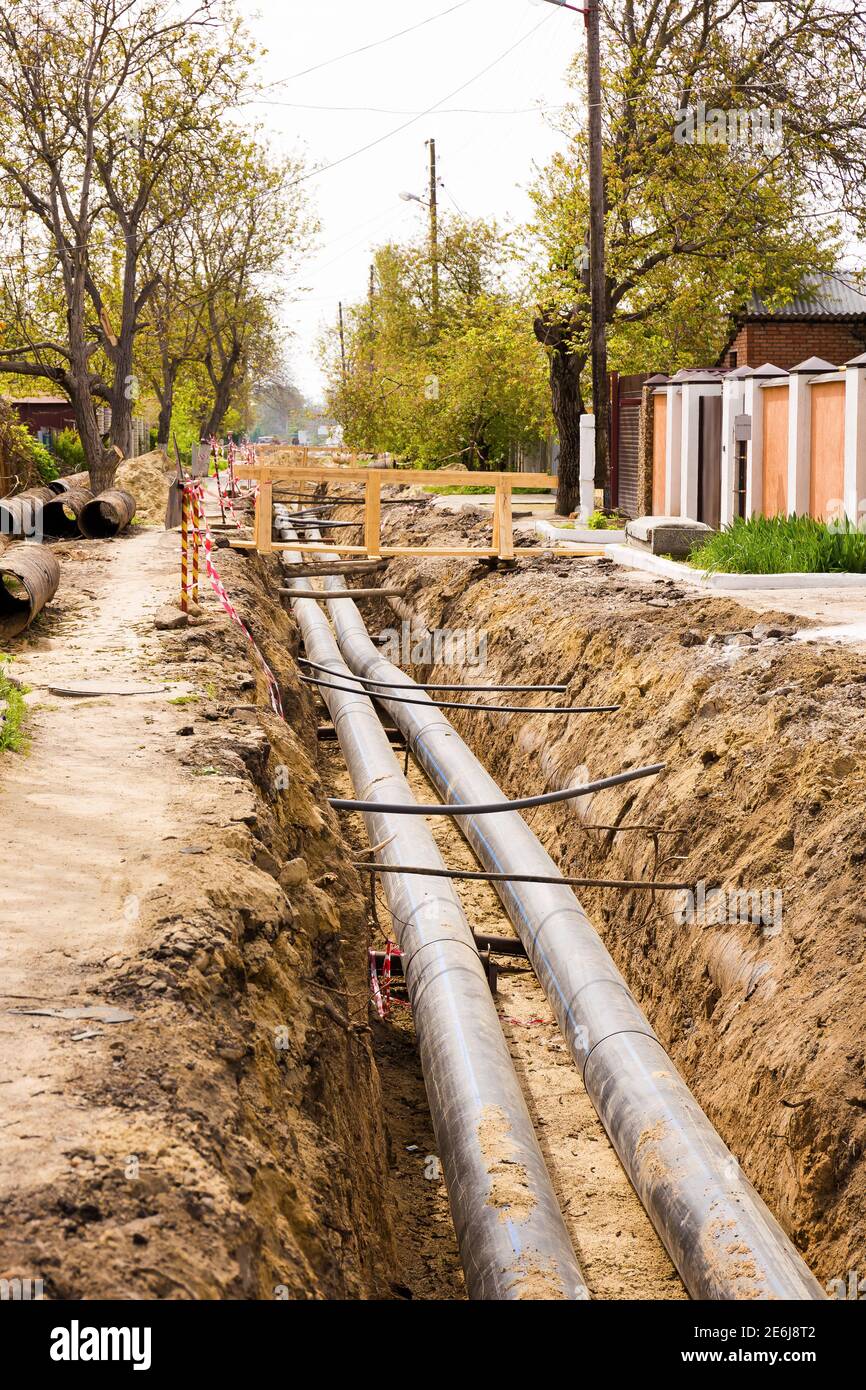 Pipes and cables. Repair of communications. Water supply, electricity ...