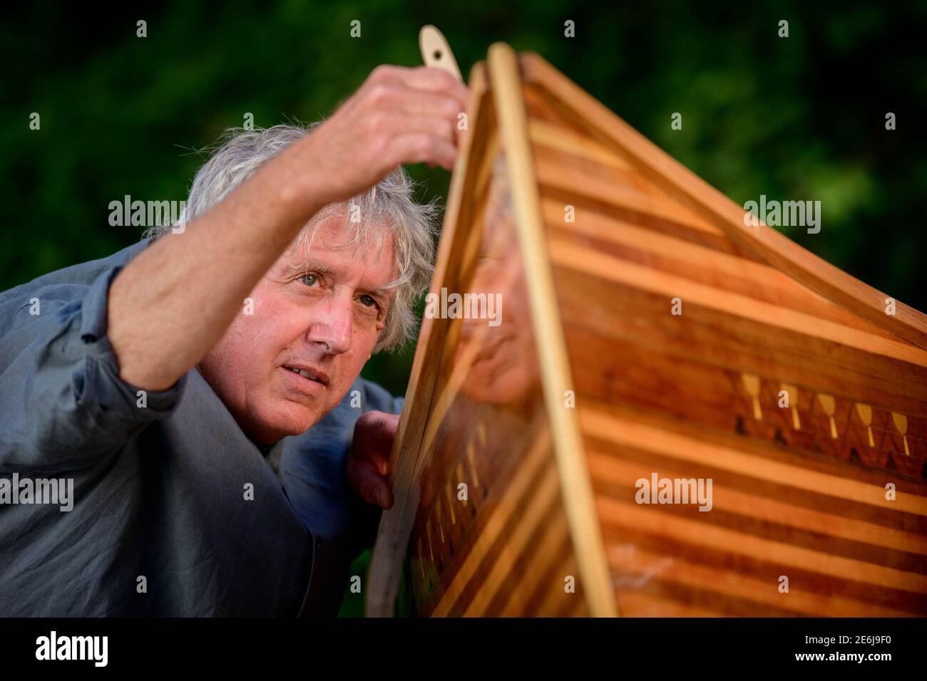 Boatbuilder Huw Edwards-Jones with his handmade Canadian canoe at ...
