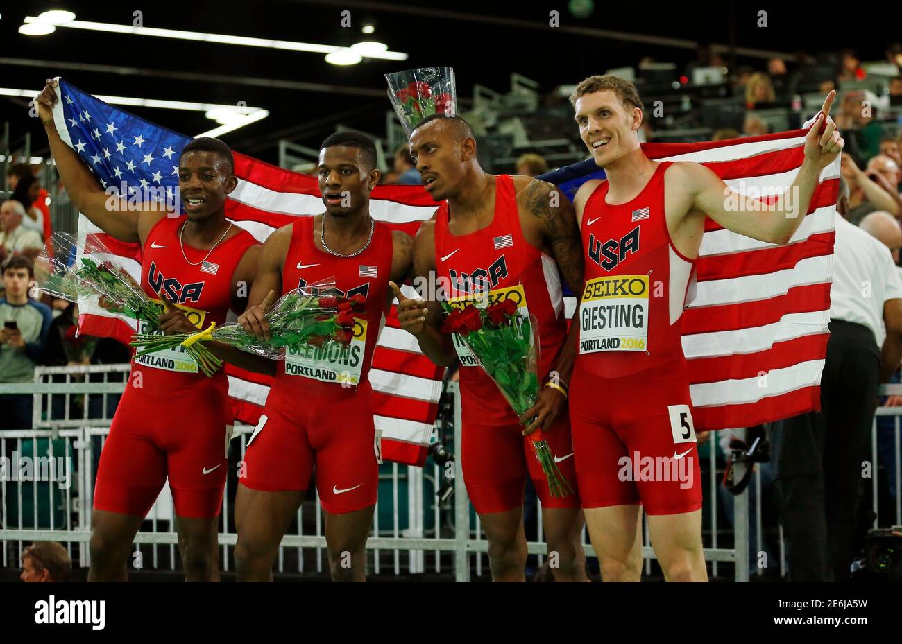 The U S Mens 4x400 Relay Team Members Pose After Winning The Gold