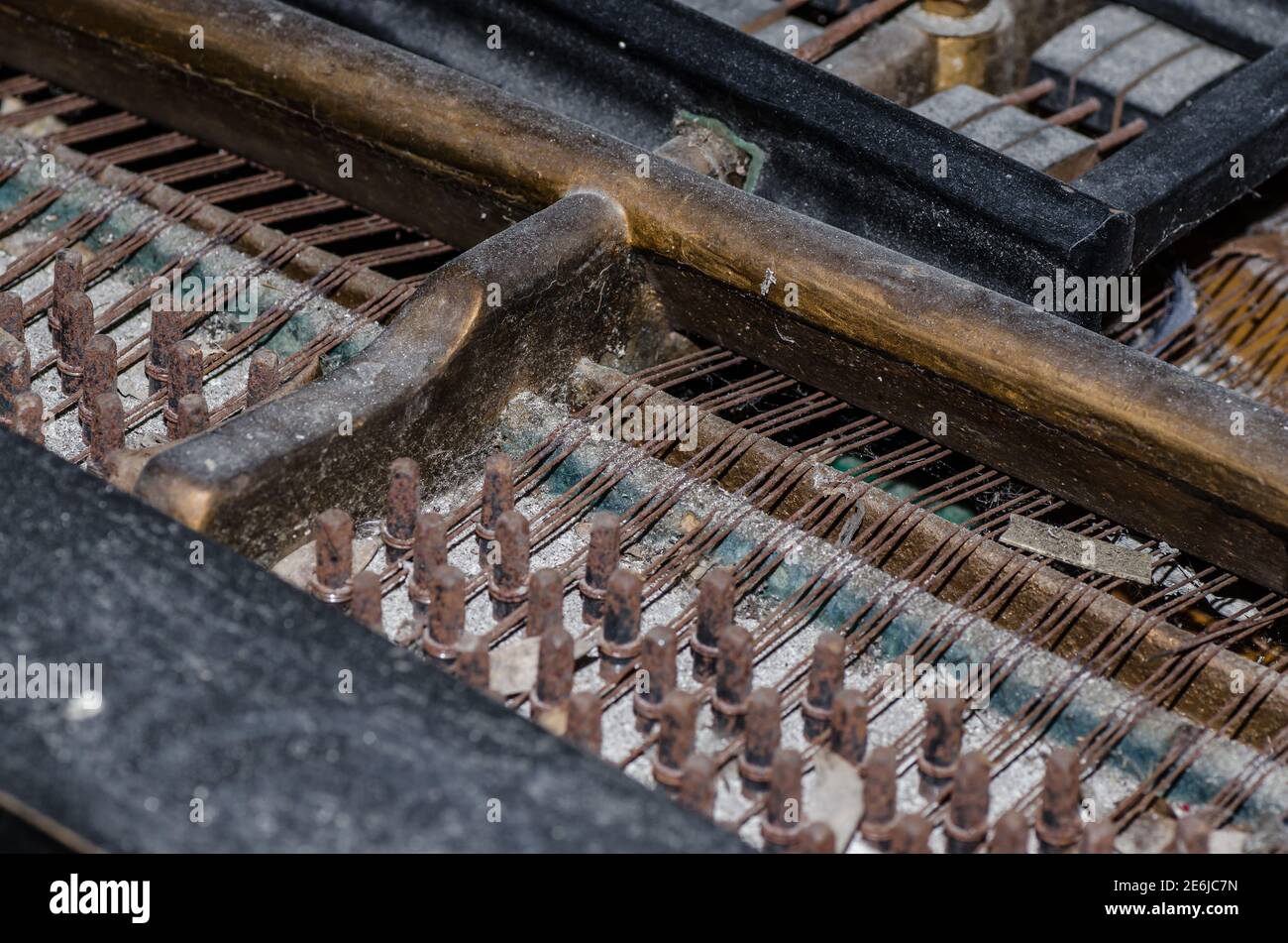 old rusty strings of a piano Stock Photo - Alamy