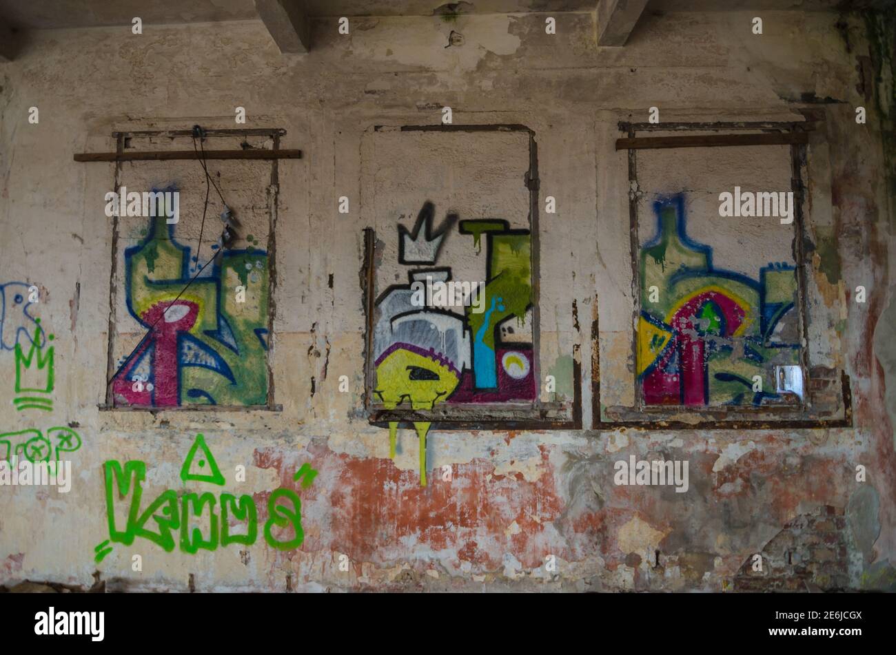 three colorful graffiti on a wall Stock Photo - Alamy