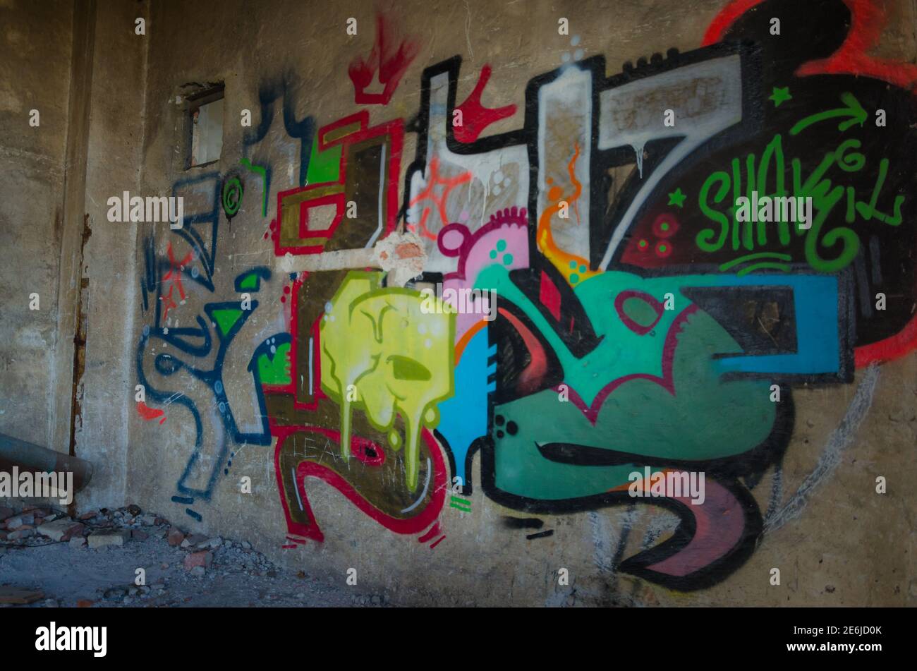 colorful graffiti on an old house wall Stock Photo - Alamy
