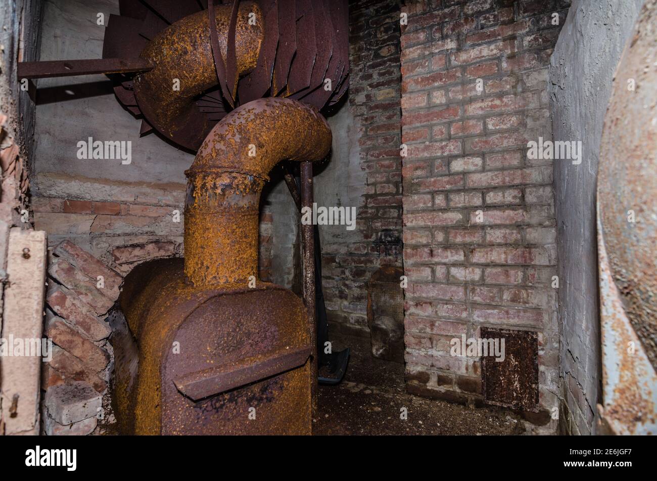 old heating system in an abandoned building Stock Photo - Alamy