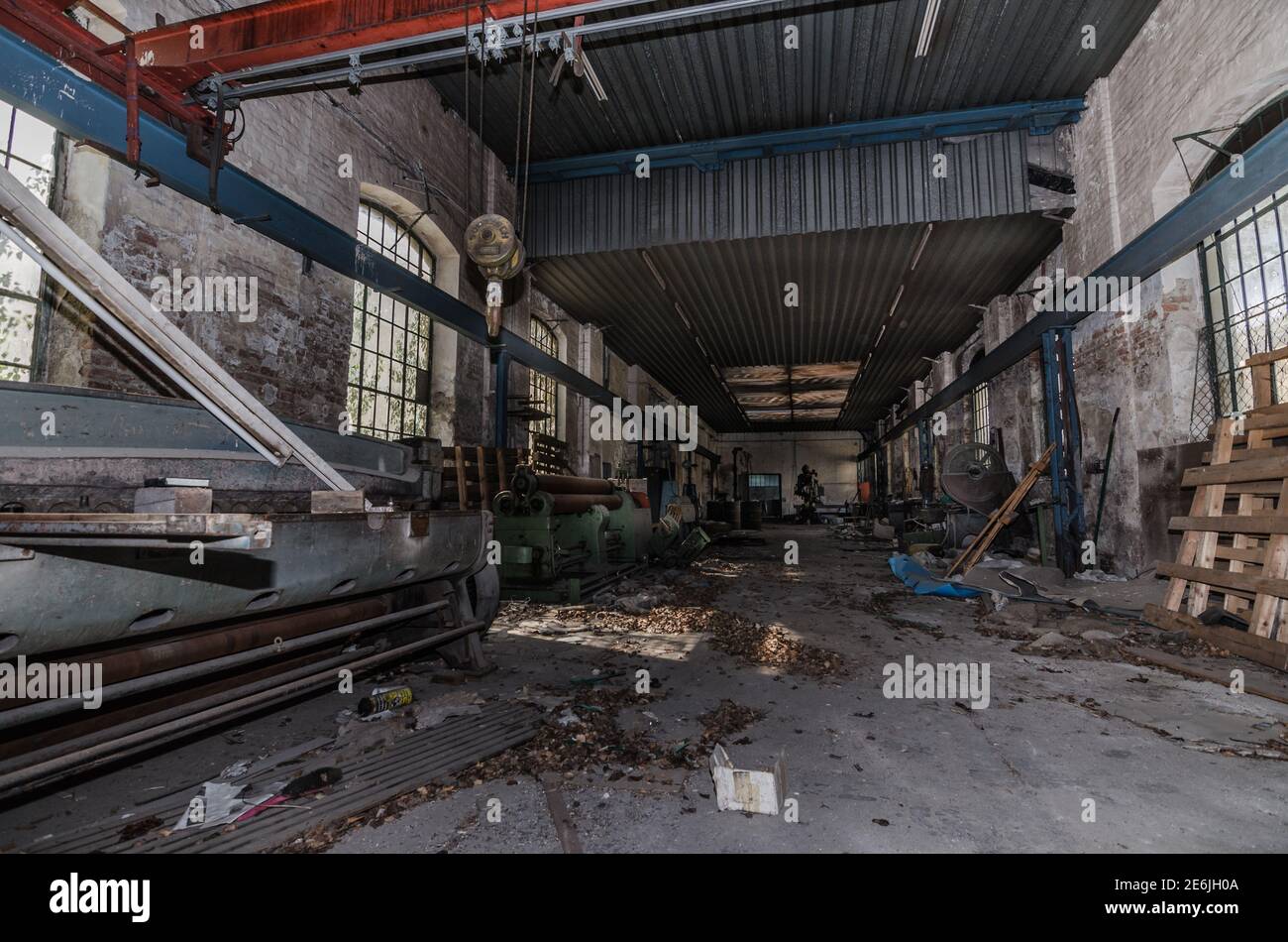 large machine hall of an old abandoned factory Stock Photo - Alamy