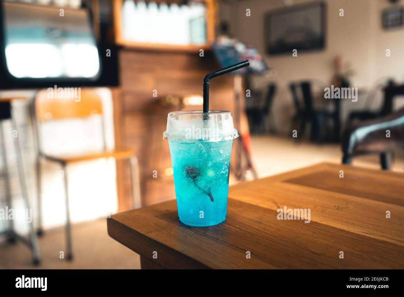 Blue cold drink in a glass on the coffee table Stock Photo - Alamy