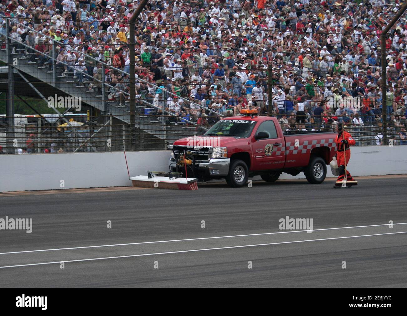 Race Crew Members cleaning Debris after Tony Kanaan's Car Crash at Indy ...