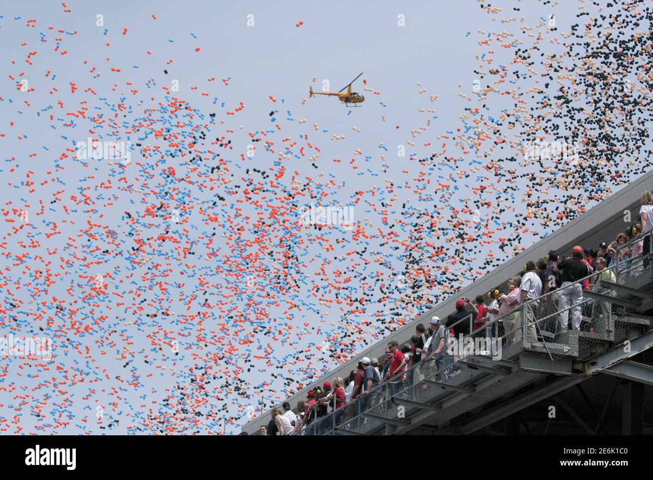 Release of The Balloons at Indy 500 Car Race with a flying Chopper and ...