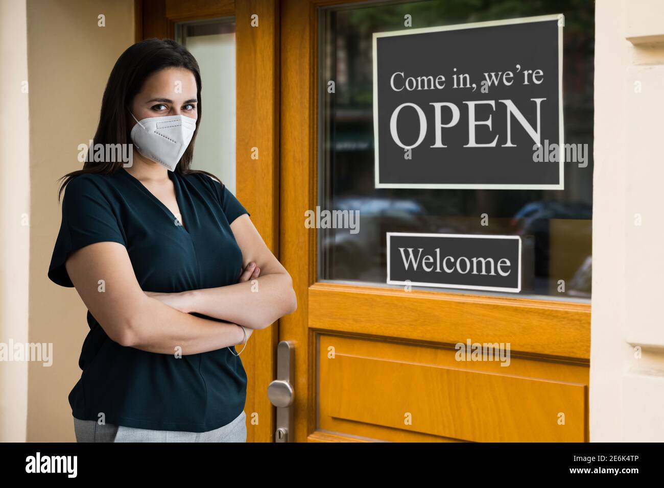 Business Owner At Store Entrance Holding Open Sign Stock Photo - Alamy
