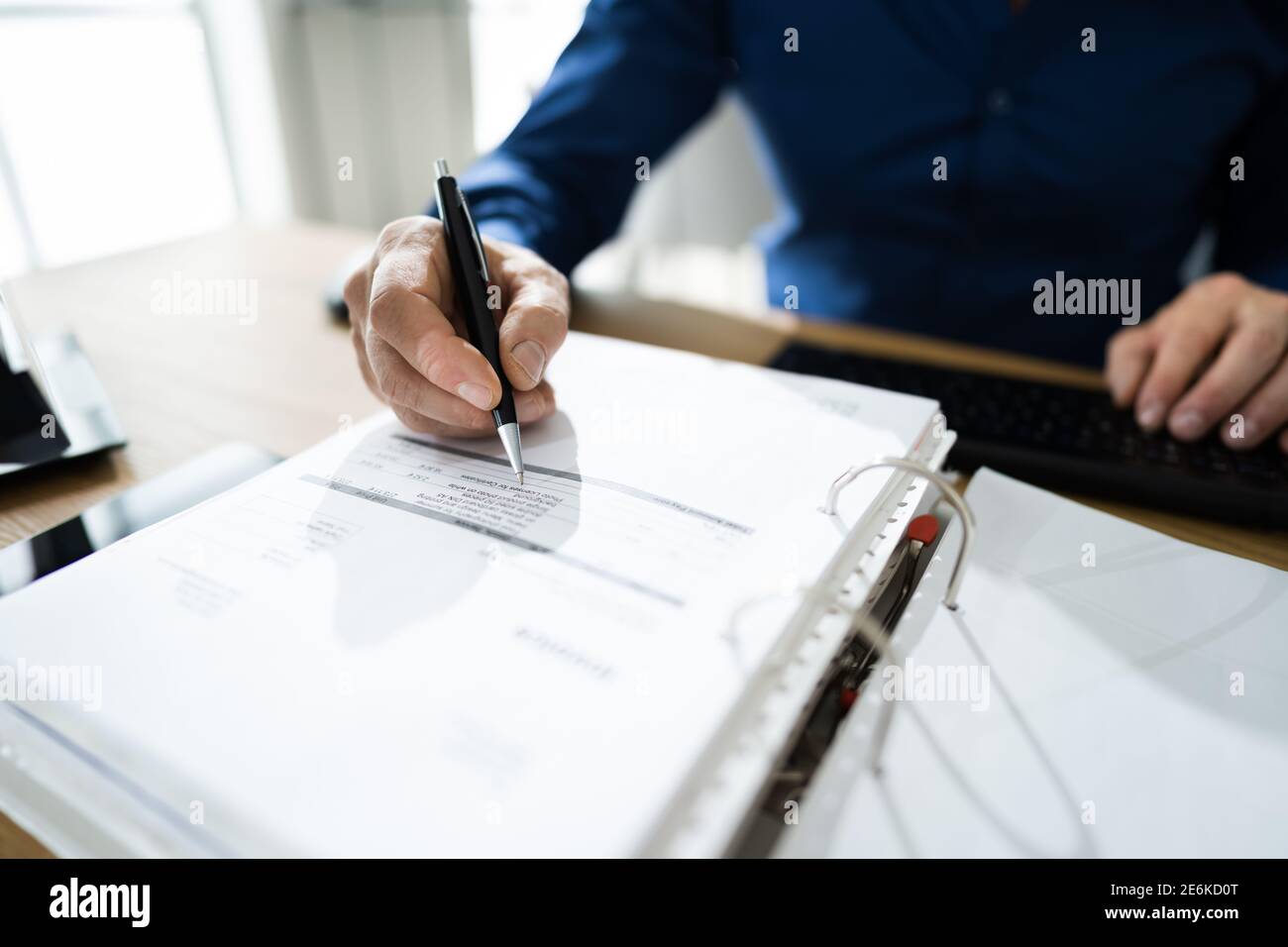 Corporate Tax Accountant At Desk Doing Invoice Bill Accounting Stock ...