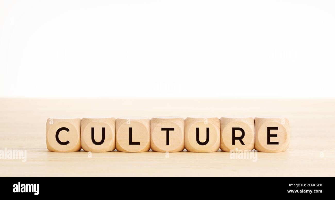 CULTURE word on wooden blocks on wood table. Copy space. White ...