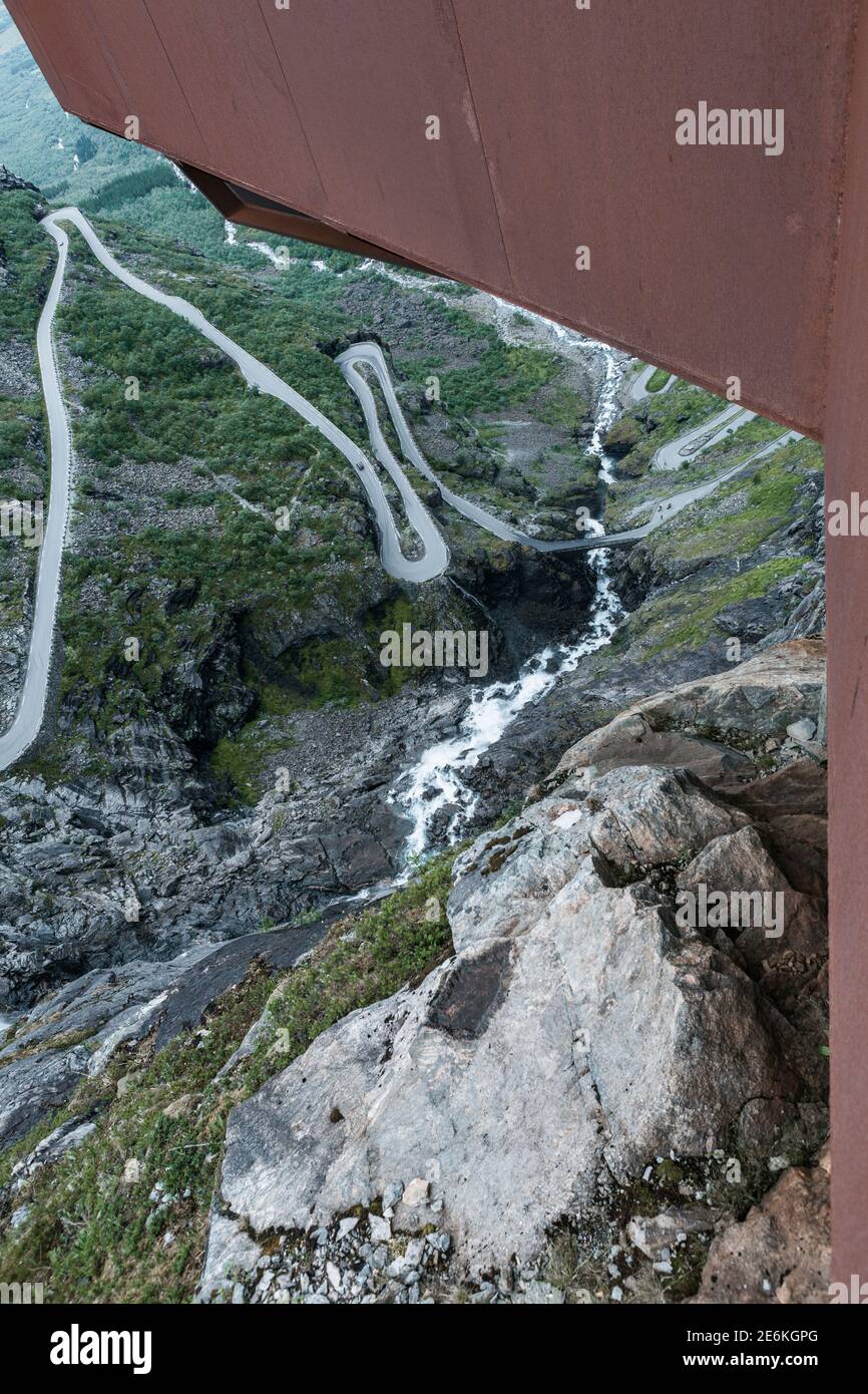 Trollstigen mountain pass with Stigfossen waterfall and the cladding of ...