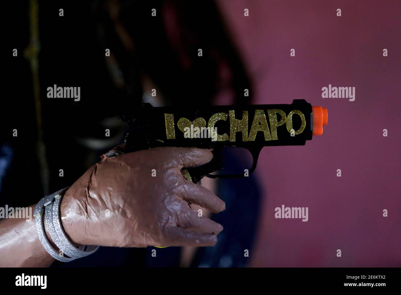 A toy gun is seen attached to a pinata depicting Mexican actress Kate ...