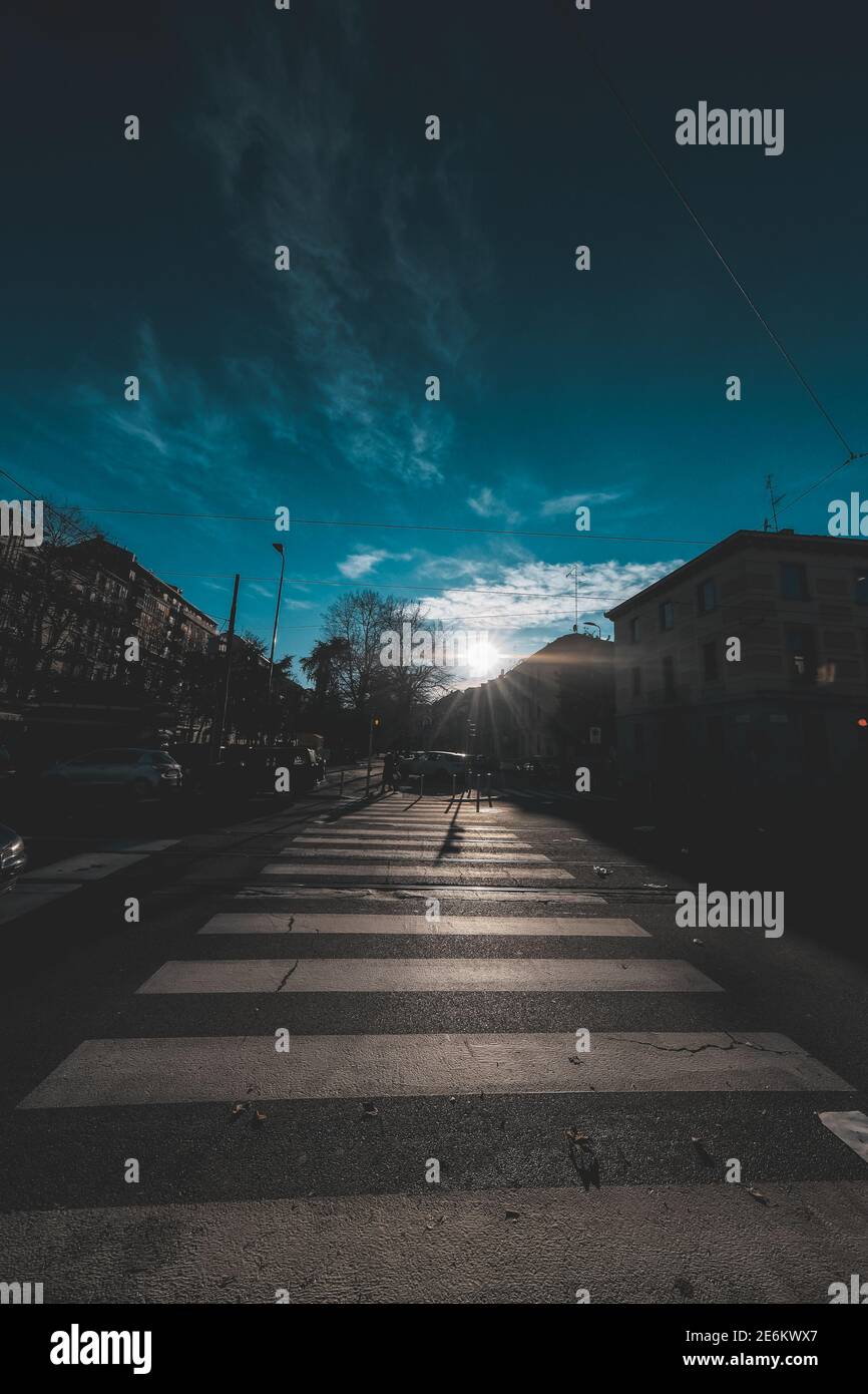 Road with a pedestrian crossing on a new asphalt with a shallow depth ...