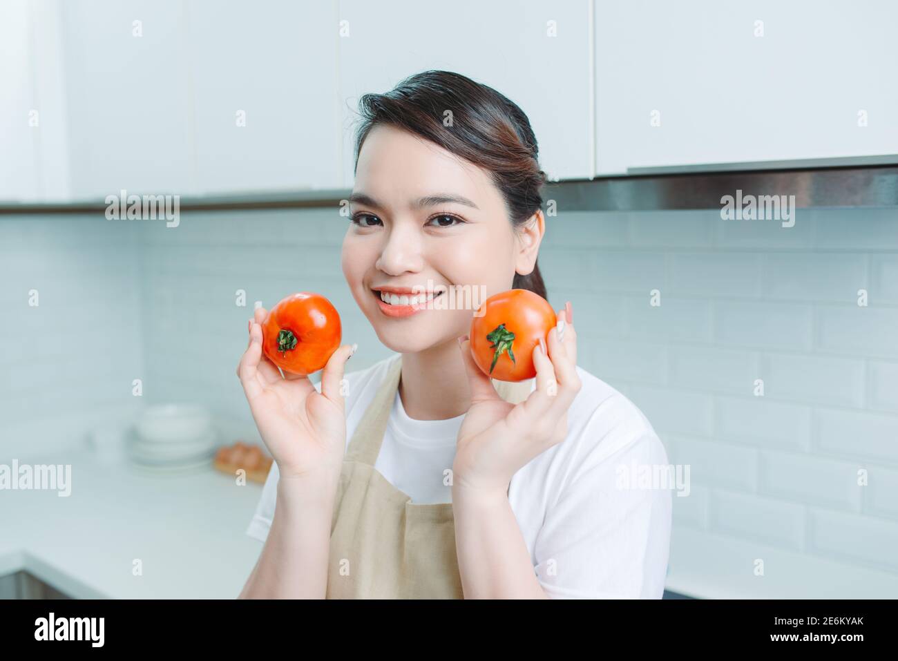 Vietnamese girl cooking hi-res stock photography and images - Alamy